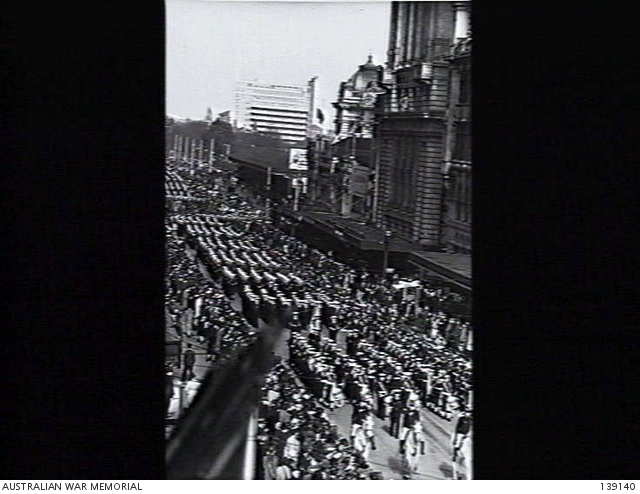 Melbourne, Vic. 1943-06-25. Members of the RAN, led by a company of the ...