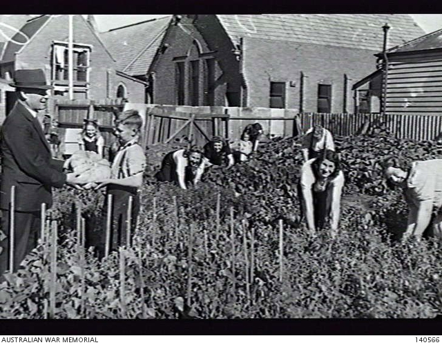 BURNLEY, VIC. 1944-03-10. PARISHIONERS WORKING IN THE COMMUNITY ...
