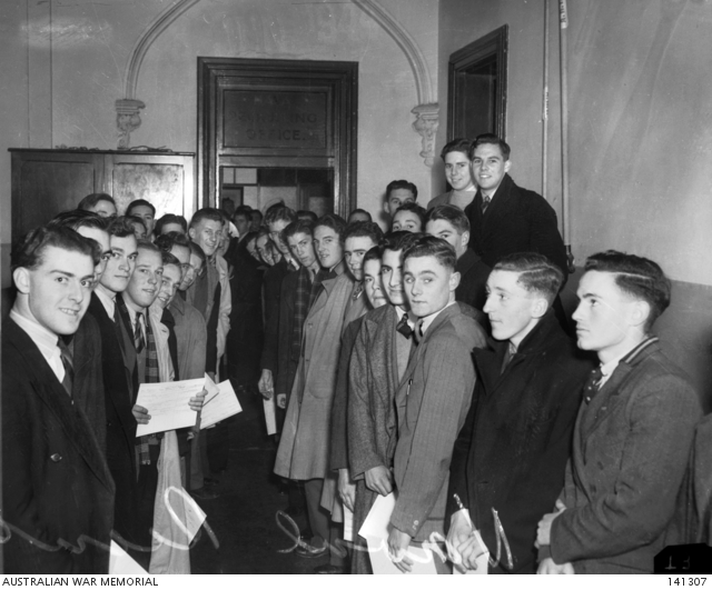 Melbourne, Vic. 1944-06-13. Recruits of the RAN queued up for their ...