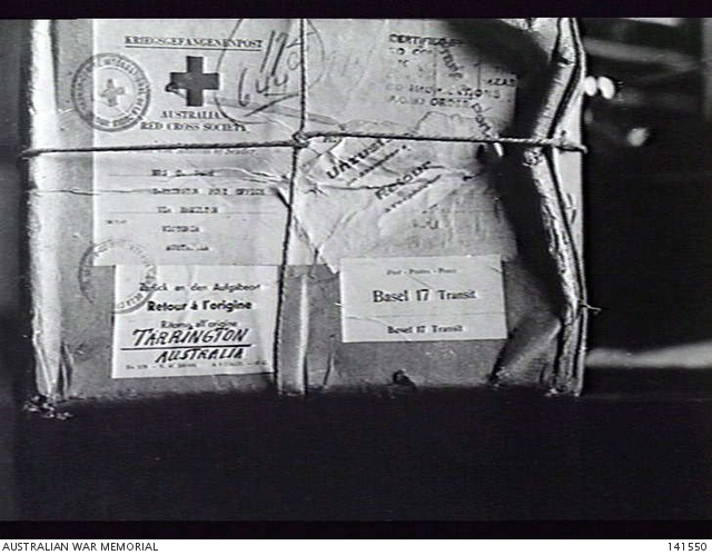Melbourne, Vic. 1944-08-09. This Red Cross parcel covered with labels ...