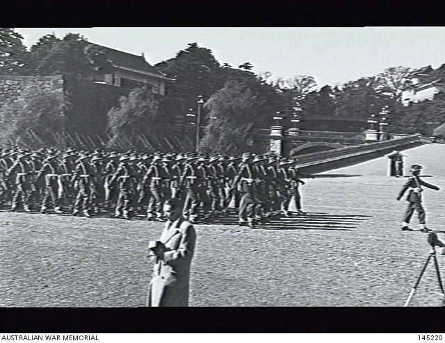 Tokyo, Japan. 1947-11-21. 66th Infantry Battalion marching past the ...
