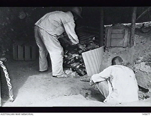 Shimogahara, Japan. 1948-06-04. Two Japanese workers at BCOF farm, one ...