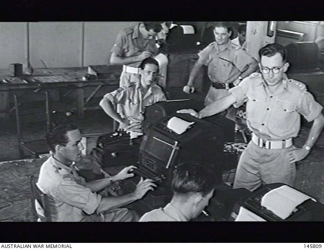 Kure, Japan. 1948-09-08. Teletype operators at Headquarters Signals ...