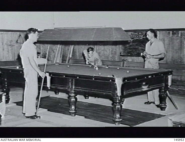 Hiro, Japan. 1948-09-14. Troops off duty enjoying a game of billiards ...