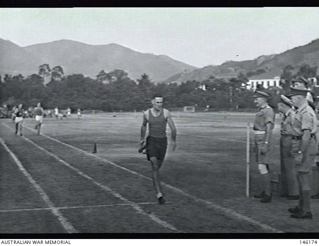 Kure, Japan. 1949-10-08. Athletes competing in the final of the 880 ...