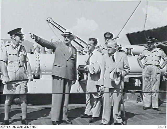 Kure, Japan. 1950-08-15. Talking on board HMAS Bataan after its arrival ...