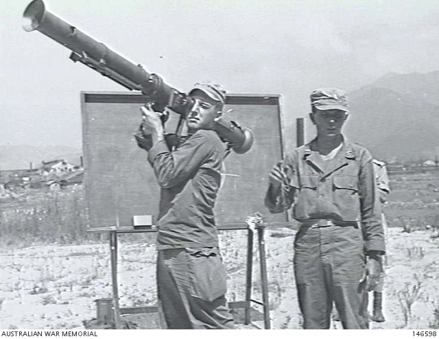 Hiro, Japan. 1950-08-09. Assistant to American 1st Lieutenant Parr ...