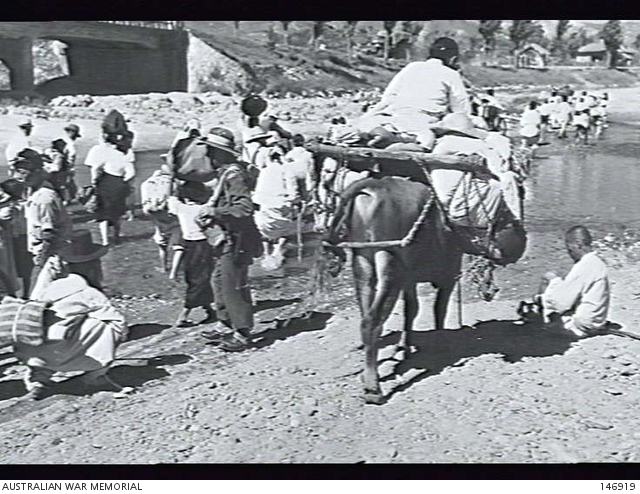 Taegu, Korea. 1950-09-28. Refugees carrying their personal belongings ...