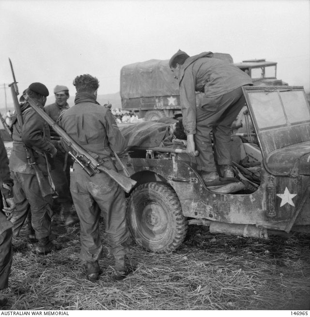 Pakchon, Korea. 1950-11-05. A soldier wounded in the action on the Hill ...