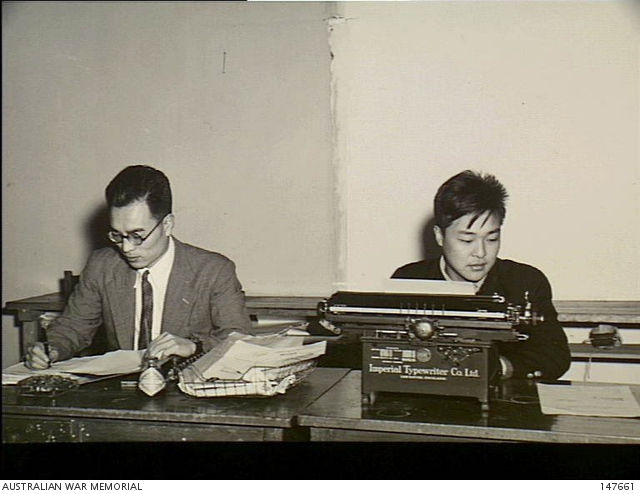 Kure, Japan. c.1951-11-25. Two Japanese civilian employees at "G ...
