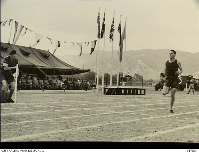 Kure, Japan. 1952-04-23. Empire games runner Lieutenant J. Humphreys ...