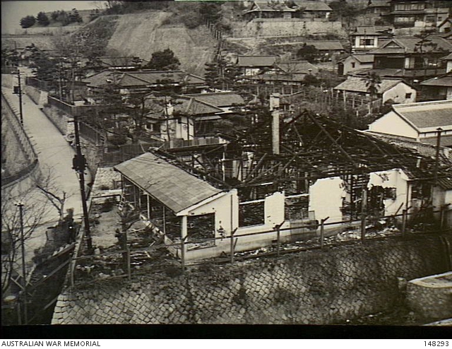 Kure, Japan. 1952-12-29. Elevated view of the burnt out shell of the ...