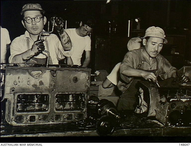 Kure, Japan. 1953-09. Japanese civilian employees working as fitters on ...