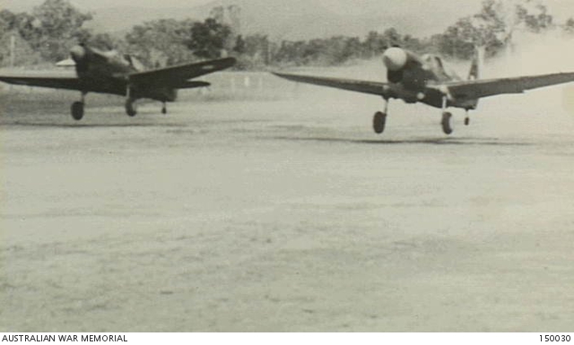 Townsville, Qld. July 1942. Two Kittyhawk fighter aircraft of No. 76 ...