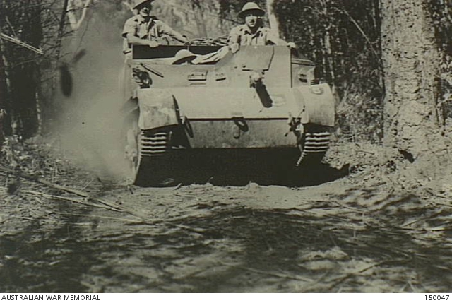 Darwin, NT. June 1942. An Australian Bren gun carrier moves along a ...