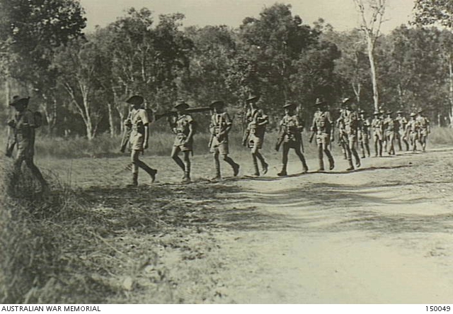 Darwin, NT. June 1942. An Australian infantry unit moves from open ...