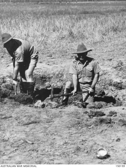 Townsville, Queensland. July 1942. Two `Diggers' searching for ...
