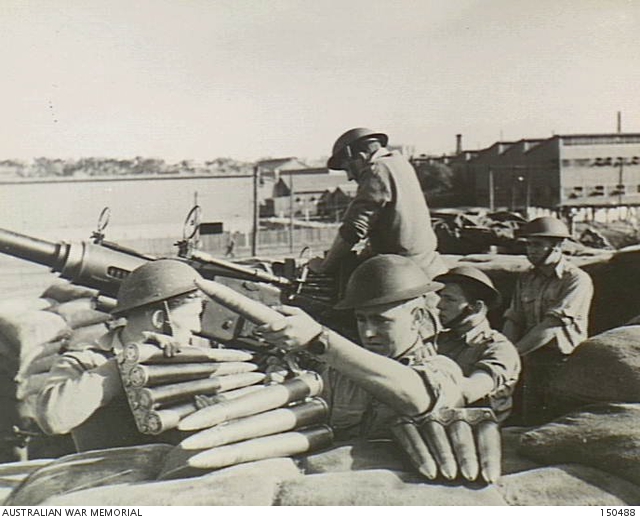 East Coast, Australia. August 1942. The crew of a 40mm Bofors anti ...