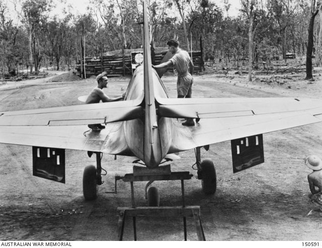 Darwin, NT. September 1942. A US Kittyhawk fighter aircraft is prepared ...