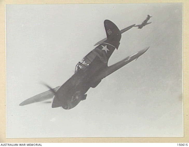 Two United States Curtiss P40 Kittyhawk fighter aircraft in loose ...