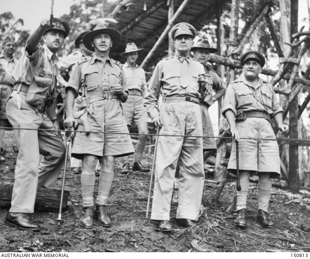 New Guinea. October 1942. Pictured, left to right: Australian Brigadier Charles Spry points out ...