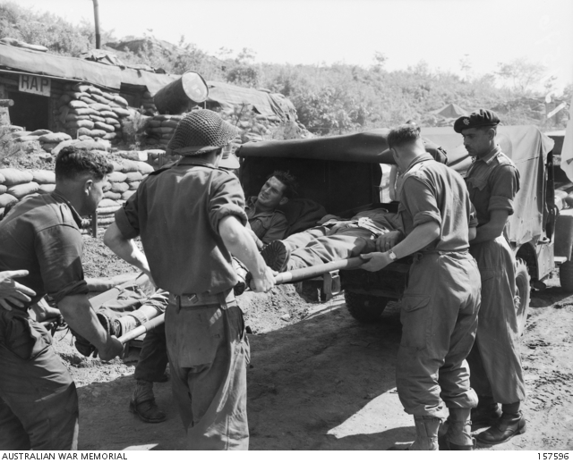Majon'ni, Korea. 1953-05-17. Stretcher bearers evacuating the injured ...