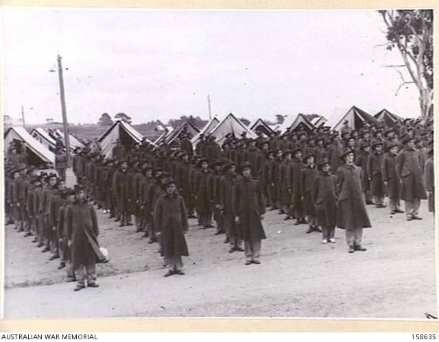 MOUNT MARTHA, VIC. 1940-09. ARMY RECRUITS LINE UP IN FRONT OF THEIR ...
