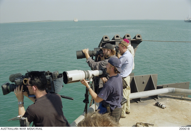 Darwin, NT. 20 September 1999. Photographers and members of the media ...