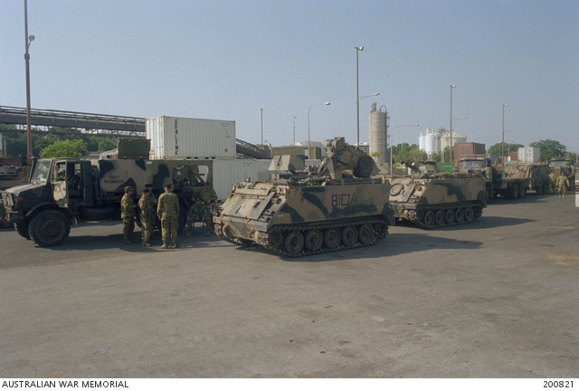 Armoured Personnel Carriers (APCs), led by 810A 'Battle Spanners', 3/4 ...
