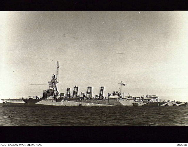 PORT SIDE VIEW OF THE CRUISER HMAS ADELAIDE. SHE IS SHOWN IN HER THIRD ...