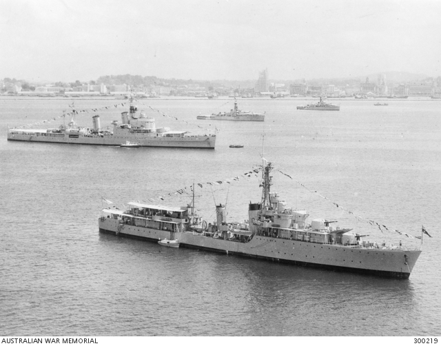 SINGAPORE ROADS. 1955-06. AERIAL STARBOARD BOW VIEW OF THE DESTROYER ...