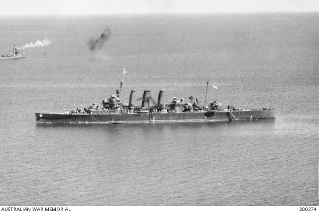 TOWNSVILLE, QLD. 1943-06-08. AERIAL BROADSIDE VIEW OF THE HEAVY CRUISER ...