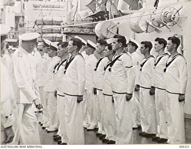1949. MEN OF THE ORDNANCE DIVISION OF THE HEAVY CRUISER HMAS AUSTRALIA ...