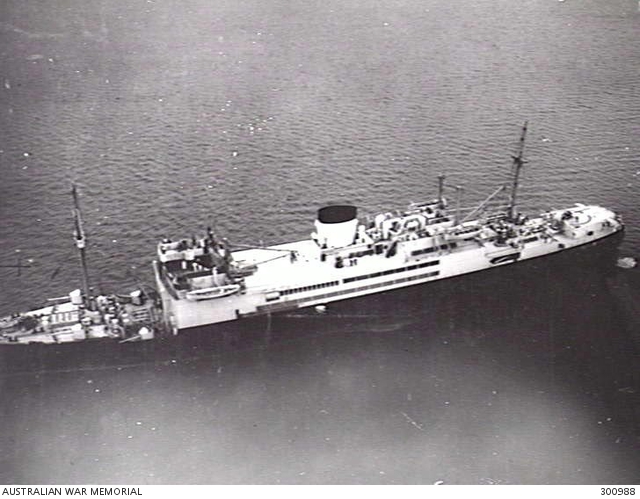 C.1940. AERIAL VIEW OF THE ARMED MERCHANT CRUISER HMAS MANOORA. SHE IS ...