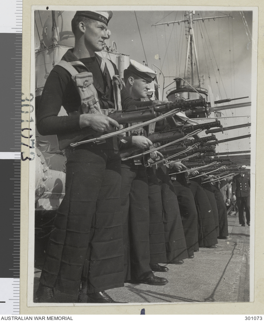 Crew members of the destroyer HMAS Napier undergoing weapon drill on ...
