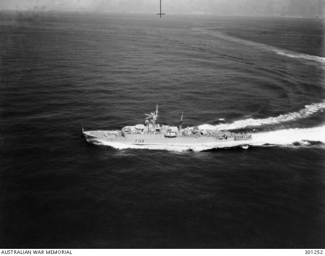 C.1958. AERIAL PORT SIDE VIEW OF THE FORMER DESTROYER HMAS QUIBERON ...