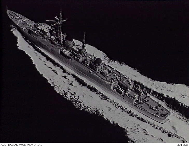 C.1958. AERIAL PORT QUARTER VIEW OF THE FORMER DESTROYER HMAS QUIBERON ...