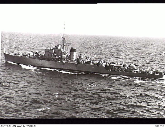 C.1947. AERIAL PORT SIDE VIEW OF THE FRIGATE HMAS SHOALHAVEN. SHE HAS A ...