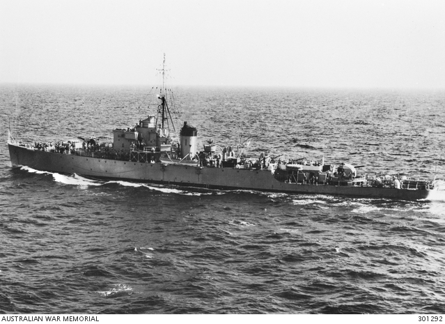 C.1947. AERIAL PORT SIDE VIEW OF THE FRIGATE HMAS SHOALHAVEN. SHE HAS A ...