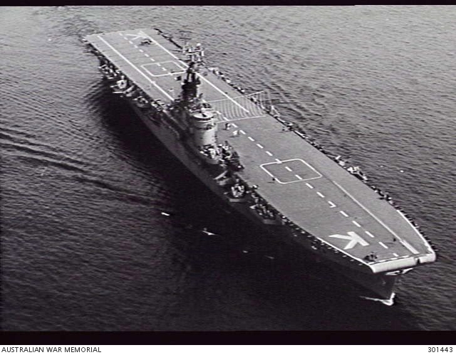 1956-10. AERIAL STARBOARD BOW VIEW OF THE AIRCRAFT CARRIER HMAS SYDNEY ...