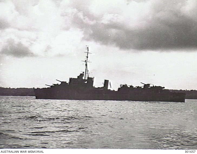 1944-12. PORT SIDE VIEW OF THE DESTROYER HMAS WARRAMUNGA SILHOUETTED ...