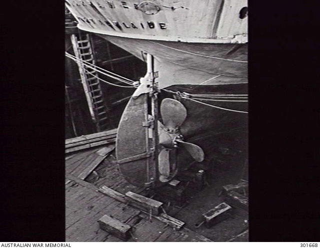 WILLIAMSTOWN, VIC. 1940. VIEW OF THE PROPELLER AND RUDDER OF THE ...