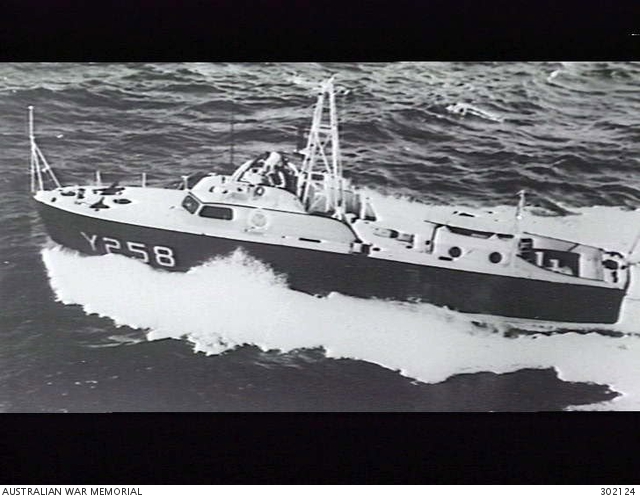 AERIAL PORT BROADSIDE VIEW OF THE AIR/SEA RESCUE VESSEL HMAS AIR FAITH ...