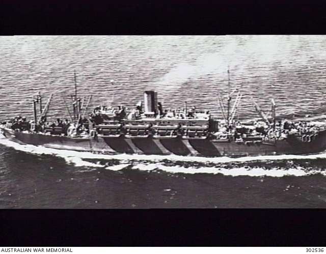 AERIAL PORT SIDE VIEW OF THE ATTACK TRANSPORT USS AMERICAN LEGION (APA ...
