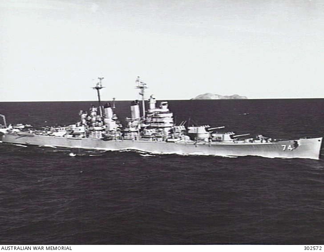 STARBOARD SIDE VIEW OF THE HEAVY CRUISER USS COLUMBUS (CA-74). HER ...