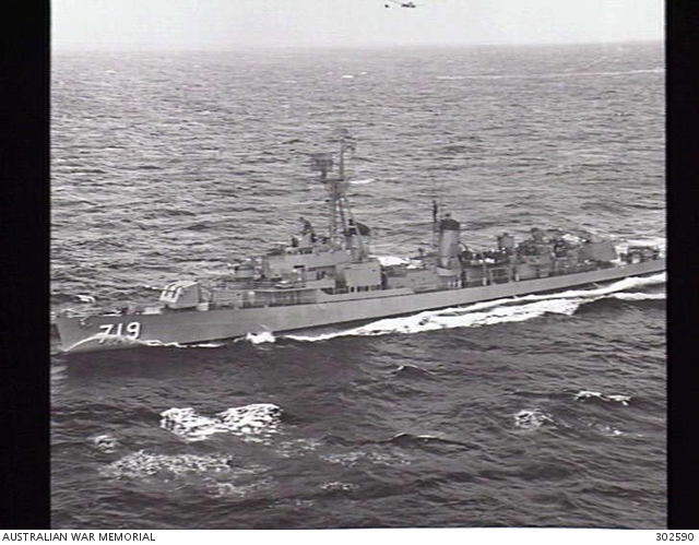 1958-03-23. AERIAL PORT SIDE VIEW OF THE FORMER FLEET DESTROYER USS ...