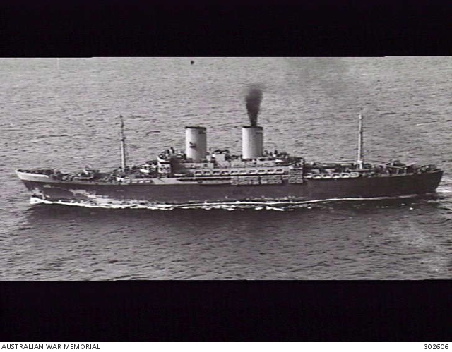 1943-10-28. AERIAL PORT SIDE VIEW OF THE TRANSPORT USS GENERAL JOHN ...
