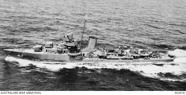 1943-03-07. AERIAL PORT SIDE VIEW OF THE DESTROYER USS HENLEY (DD-391). NOTE THAT THE AFTER 5 ...