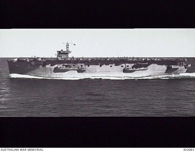 1943-07-02. PORT SIDE VIEW OF THE ESCORT CARRIER USS NASSAU (CVE-16 ...