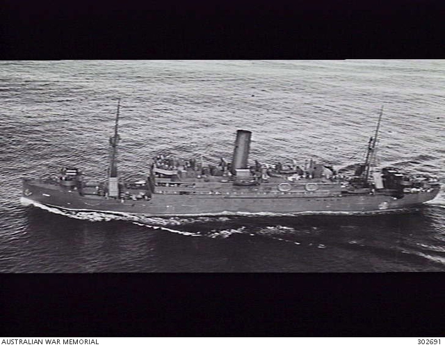 1944-04-24. AERIAL PORT SIDE VIEW OF THE STORESHIP USS OCTANS (AF-26 ...